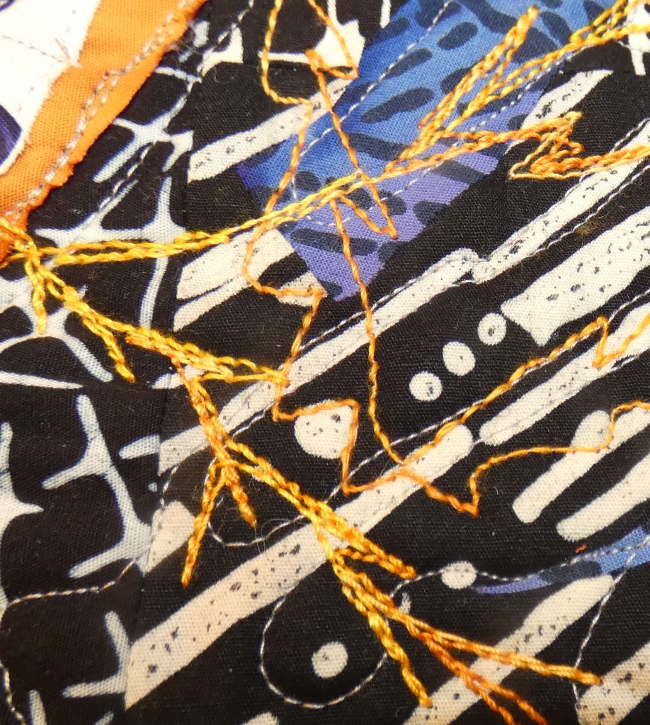 orange stitching | Deep in the Heart of Textiles
